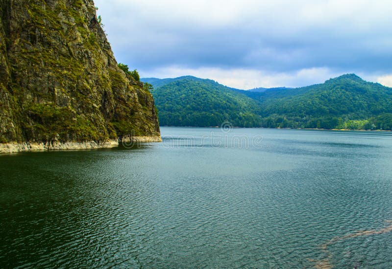 Vidraru Mountain Lake In Romania Stock Photo - Image of colorful ...