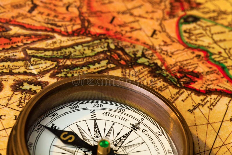 Viejo compás con el mapa foto de archivo. Imagen de conquiste - 29385750