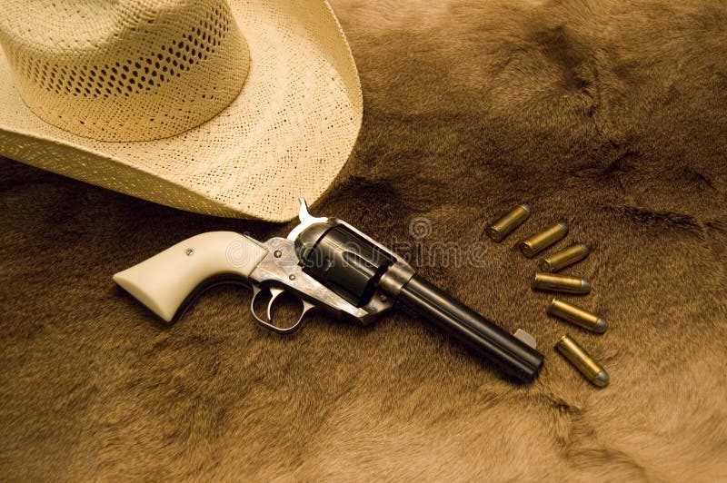 Revólver Del Oeste Americano Del Pacificador De La Leyenda En La Madera ...