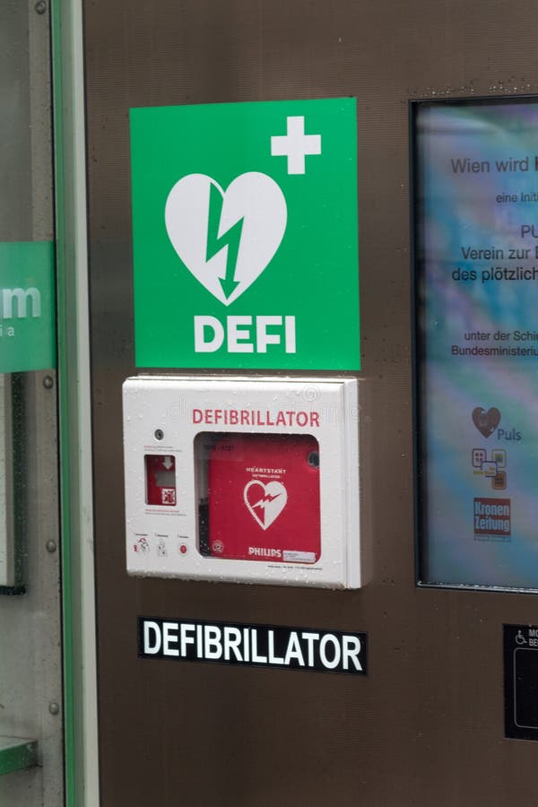 Automated External Defibrillator AED in White Box on the Wall Editorial ...