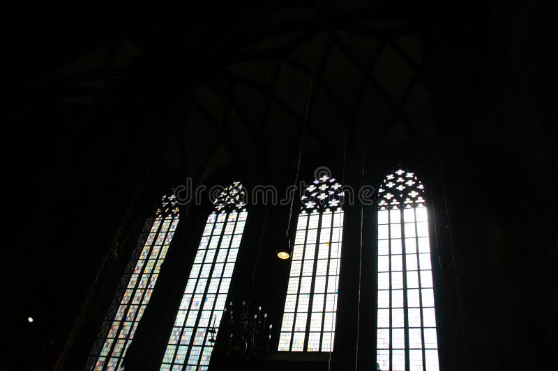 VIENNA, AUSTRIA - SEPTEMBER 09, 2017: Gothic Windows in a Dark Church ...