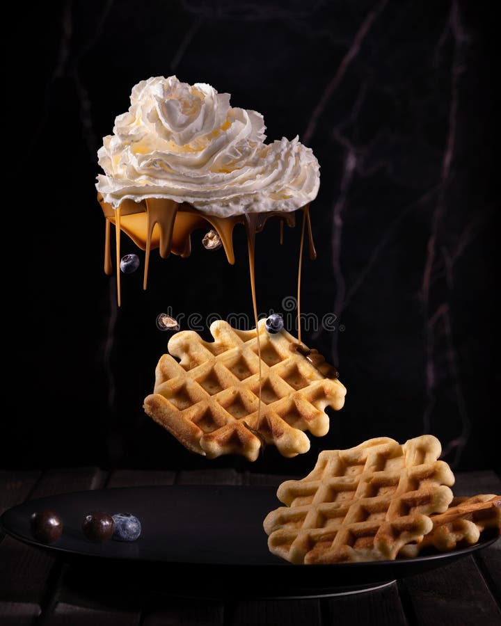 Viennese Waffles and Cream in the Form of a Cloud. Chocolate Rain Stock ...