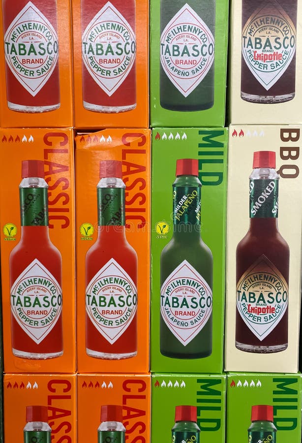 View on Stack Tabasco Spice Bottles in Shelf of German Supermarket ...