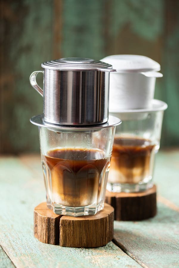 Vietnamese Coffee in Glass Cups on Old Boards, Phin Filter Stock Image ...