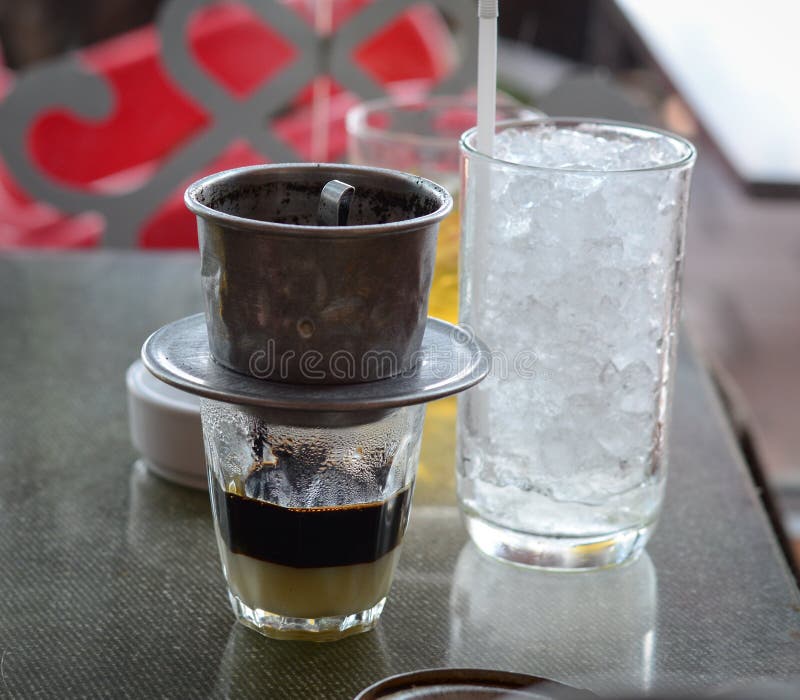 Vietnamese Coffee with Milk Stock Photo - Image of macro, blooming ...