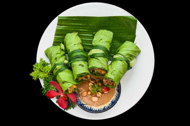 Vietnamese Green Nem Spring Rolls in Leaf with Sauce Stock Photo ...