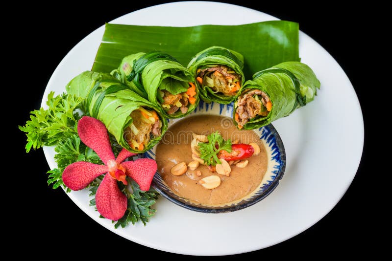 Vietnamese Green Nem Spring Rolls in Leaf with Sauce Stock Photo ...