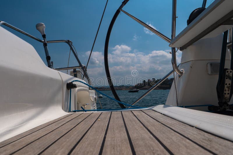 View Aboard a Ship with a Calm Dark Sea in the Background Under a ...