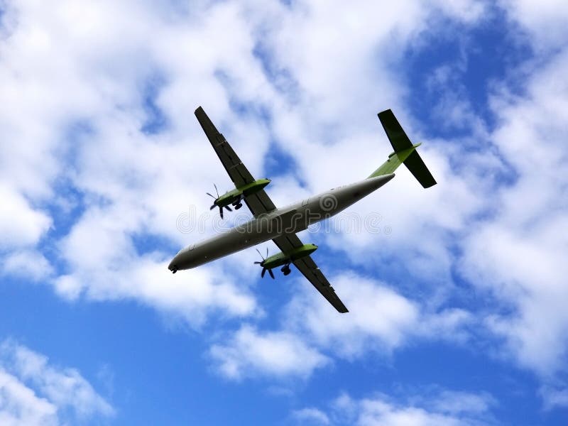 View from Above on Airplane in Flight. Aircraft is Flying in Blue ...