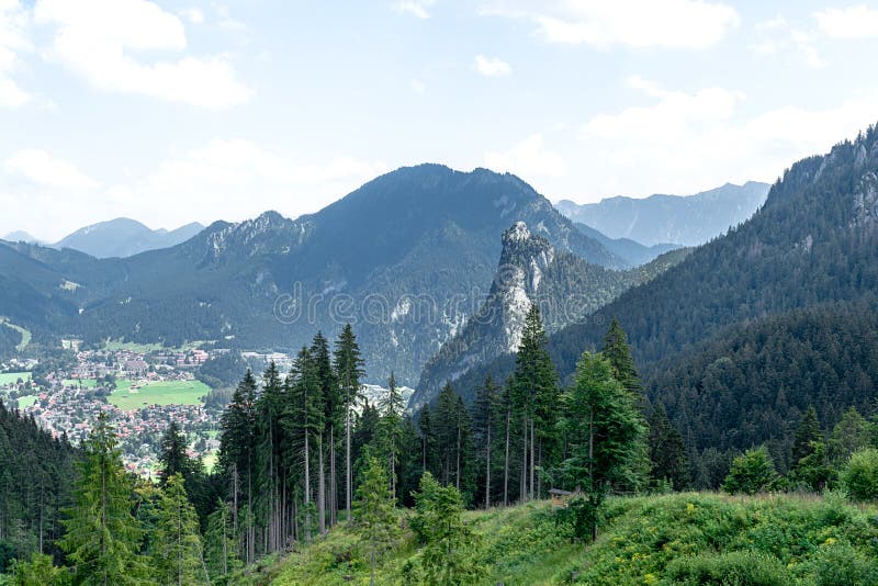 View from Above on the City in the Valley between the Mountain Ranges ...