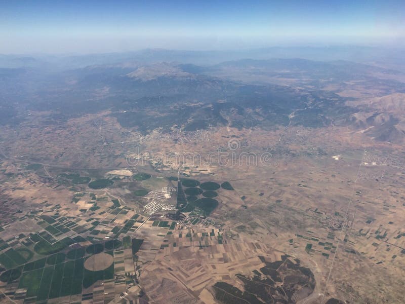 View from Above of Different Colored Fields, Forests and Small Towns ...