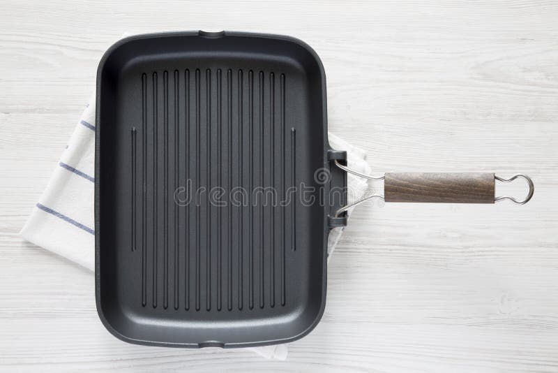View from Above, Empty Grill Pan on a White Wooden Surface. Top View ...