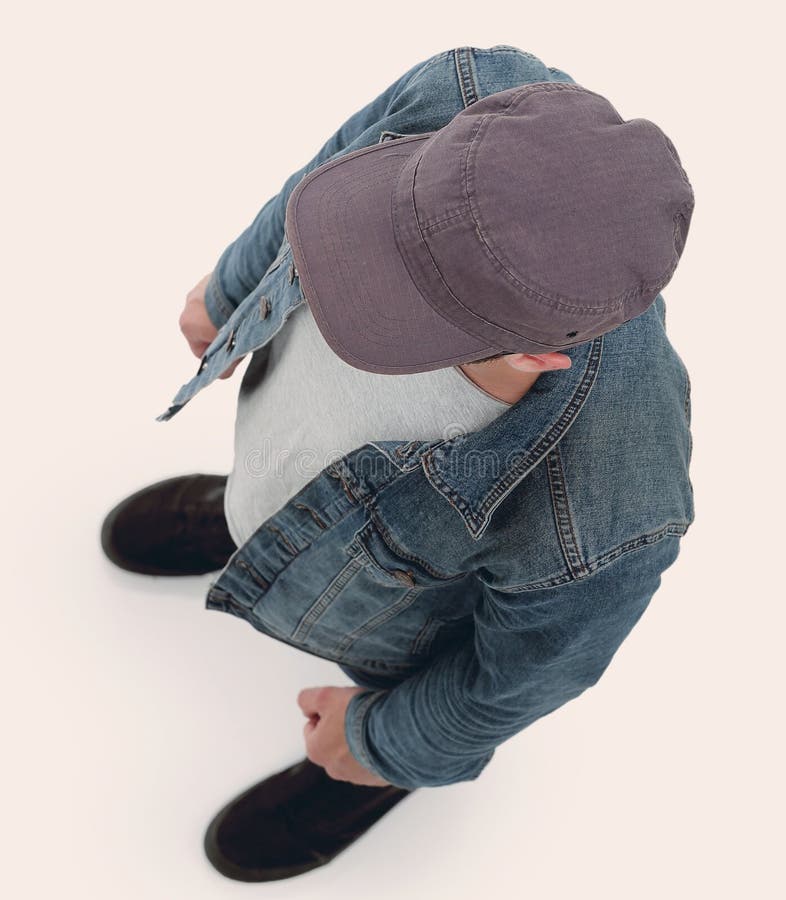 View from Above. Guy in a Baseball Cap and Denim Jacket Stock Image ...