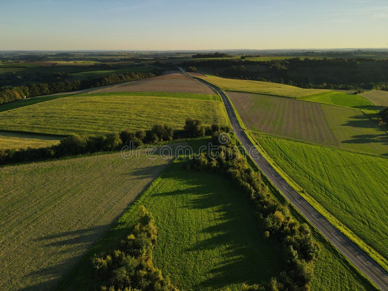 View from Above of a Landscape with a Road and Agriculture Fields on a ...