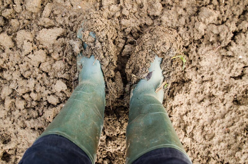 View from Above on Pair of Boots in a Mud Stock Photo - Image of rugged ...
