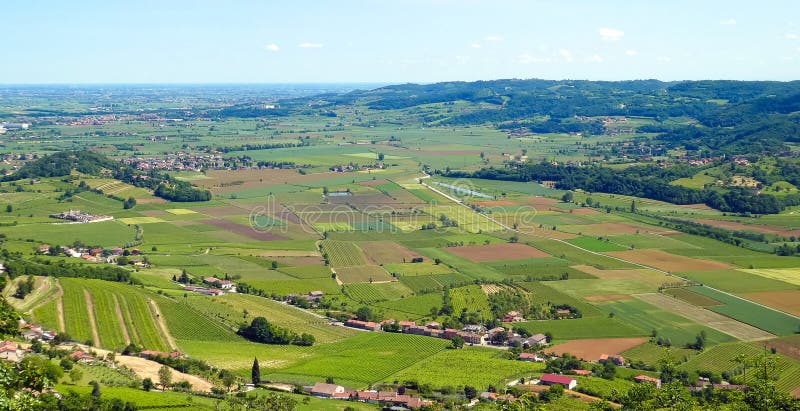 View from Above of the Plain with Cultivated Fields and Some Farms ...