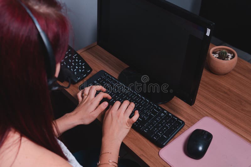 View from Above of a Woman Typing while Working on the Computer in Her ...