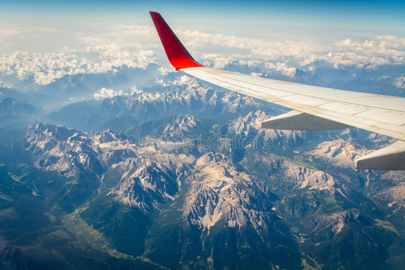 View from the Airplane Window on the Alps Stock Photo - Image of blue ...