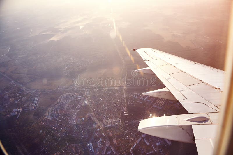 View from an Airplane Window Down To the Ground. Stock Image - Image of ...