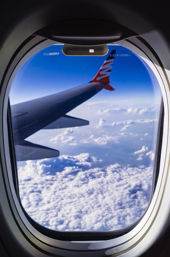 View from Airplane Window To See Sky on Evening Time. Stock Photo ...