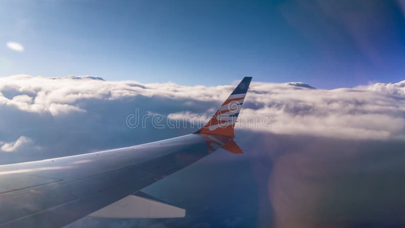 View from Airplane Window To See Sky on Evening Time. Editorial Stock ...