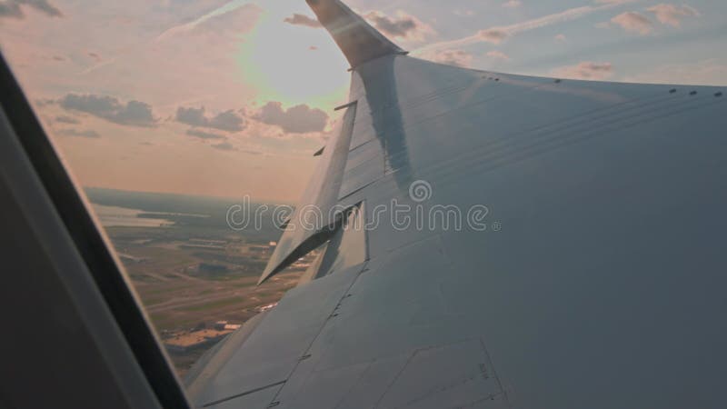 View from the Airplane Window of the Wing with Flaps during Landing at ...