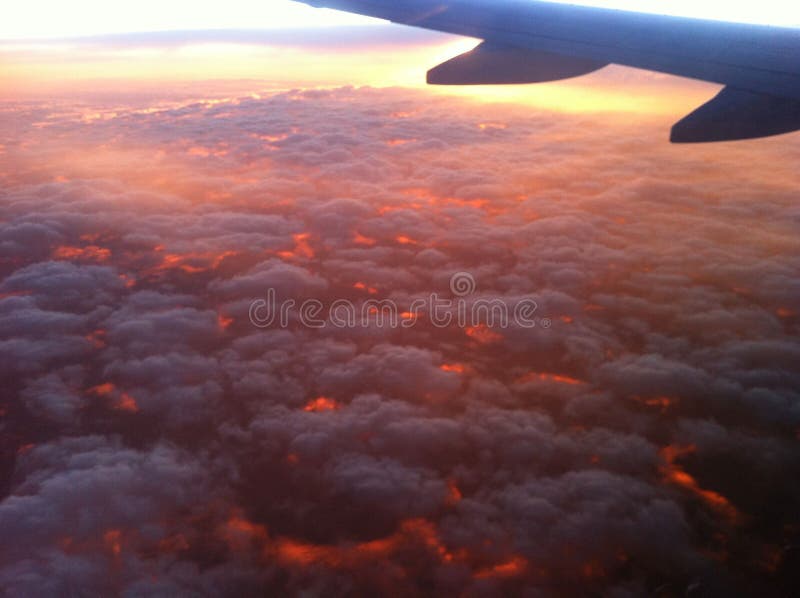 View of the Airplane Wing on a Sunset Stock Photo - Image of high ...