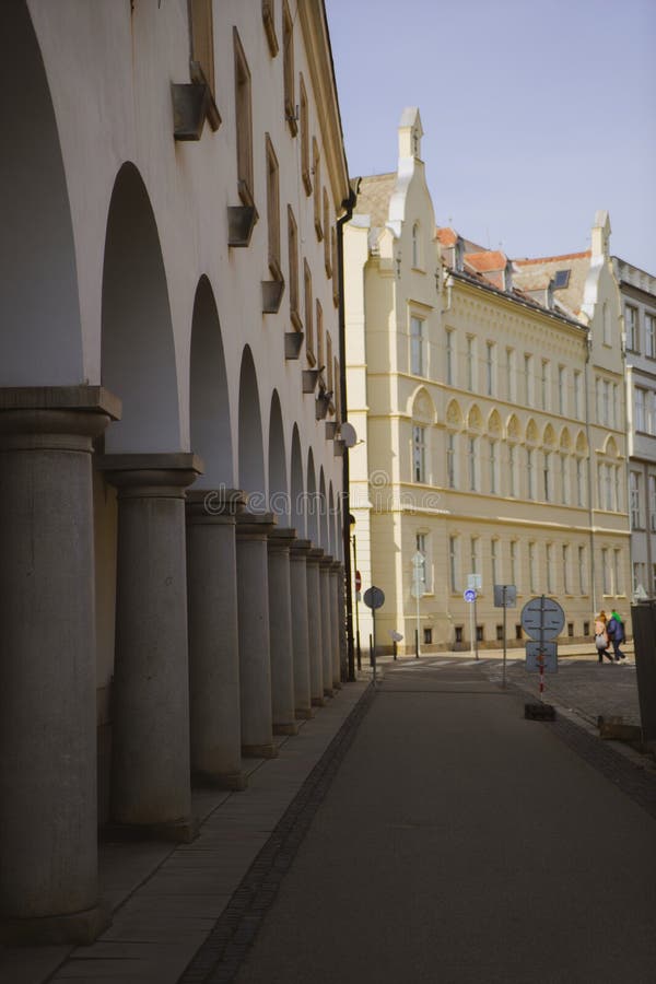 A View Along the Side of a Historical Building Facade Featuring a ...