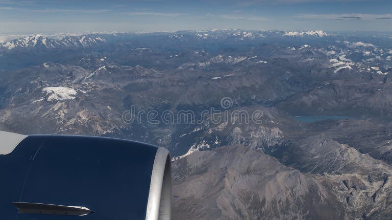 The Alps out of the plane stock image. Image of alpine - 49187383