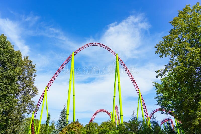 View of Amusement Park Roller Coaster with Against Sky with Clouds ...