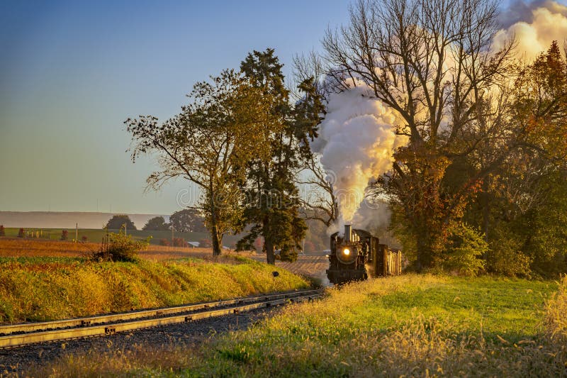 View of an Antique Freight Steam Train Blowing Smoke Approaching Thru ...