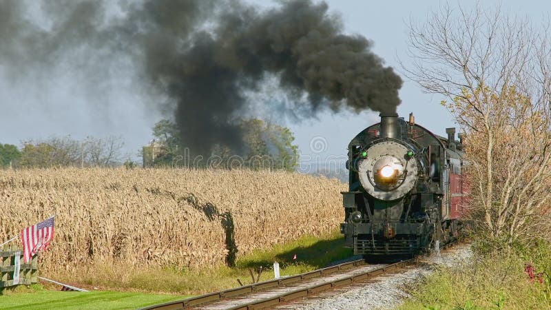 View of an Approaching Antique Steam Passenger Train, Blowing Black ...