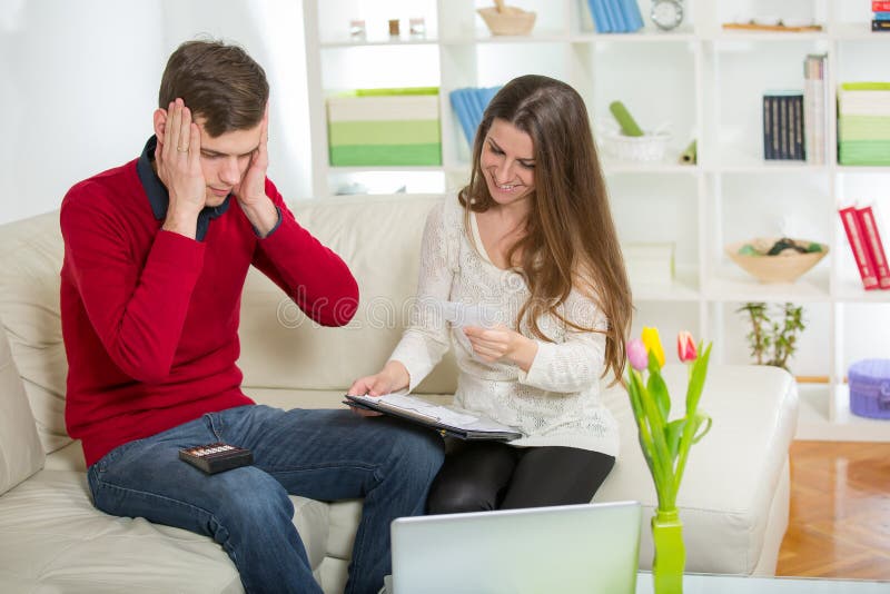 View of an Attractive Couple Doing Administrative Paperwork Stock Photo ...