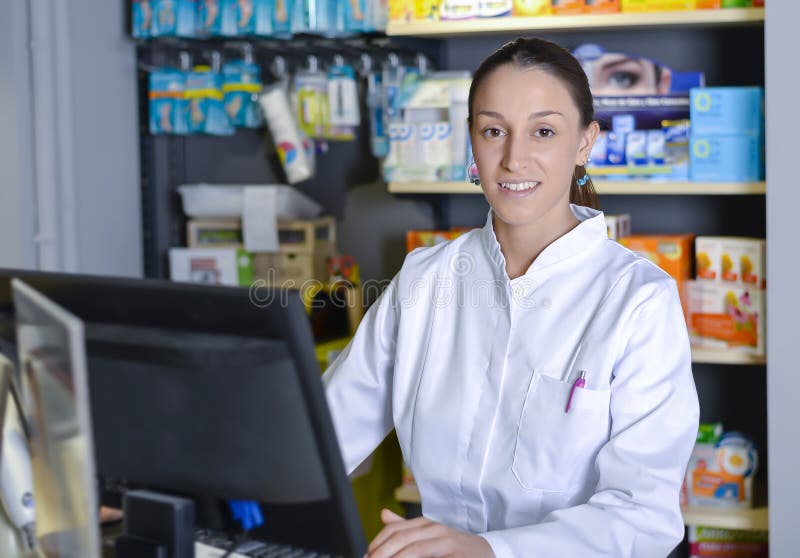 View of an Attractive Pharmacist at Work Stock Image - Image of monitor ...