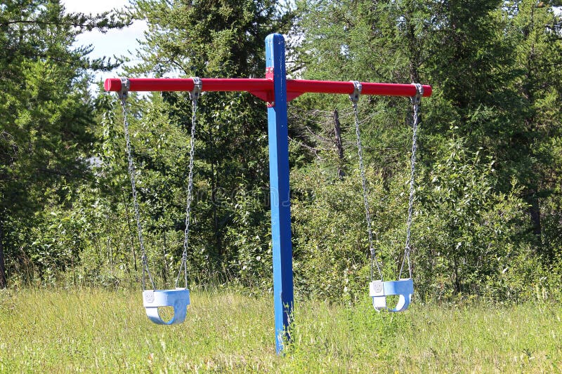 A View of Baby Swings in a Playground Stock Photo - Image of game ...