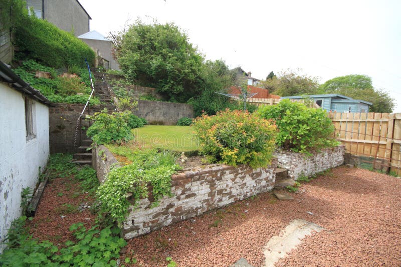 View of the back garden stock photo. Image of tree, walled - 197058312