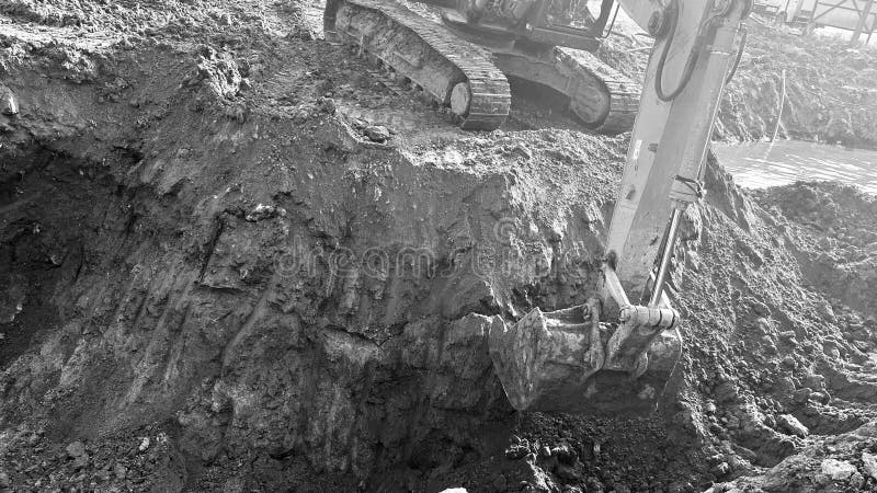 View of Backhoe Front Loader that Holds the Sand by Taking it from the ...