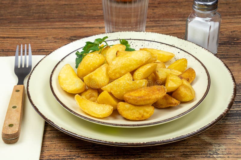 Baked Potato in a Plate on a Wooden Table Stock Photo - Image of cooked ...