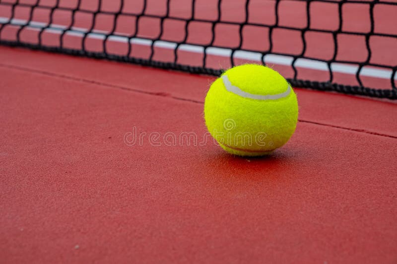 View of a Ball on a Red Tennis Court Stock Photo - Image of lifestyle ...