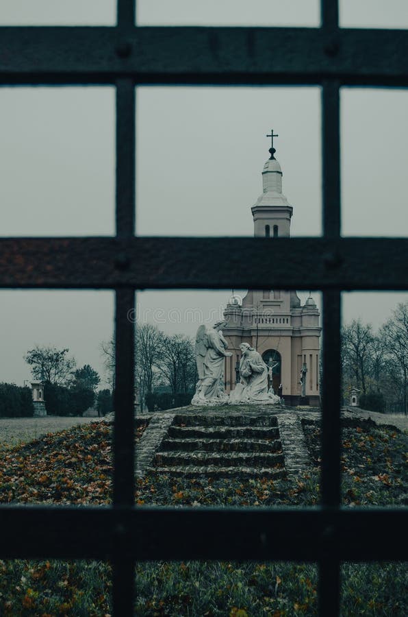 A Gothic Scene of a Crow on a Clock, Set Against a White Backdrop with ...