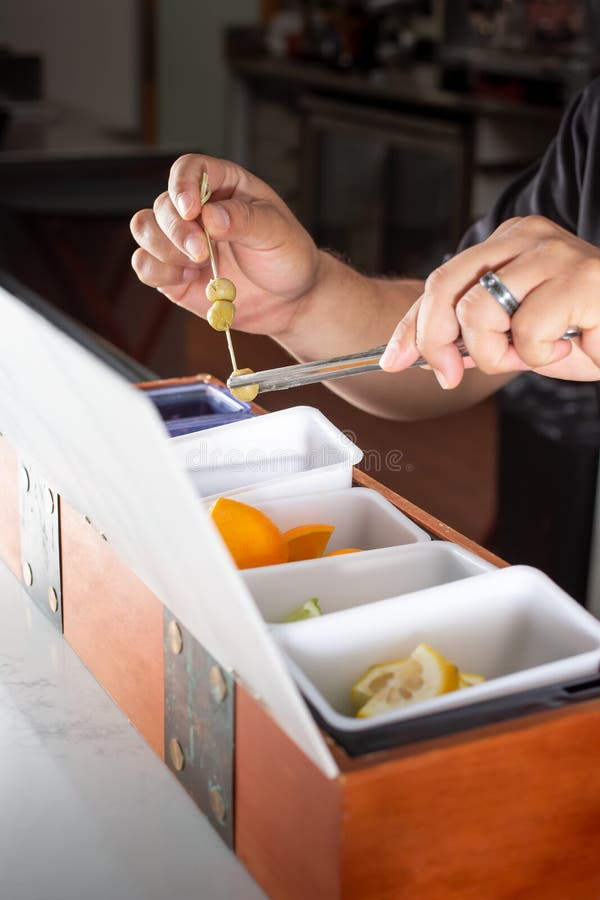 Bartender Prepared Garnishes Stock Image - Image of hands, glass: 239060599