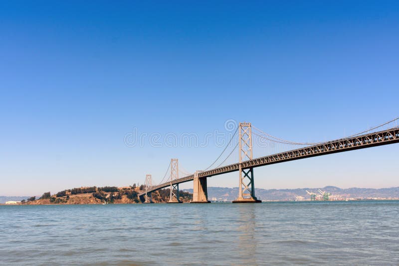 View of the Bay Bridge Spanning Across Calm Waters of San Francisco Bay ...