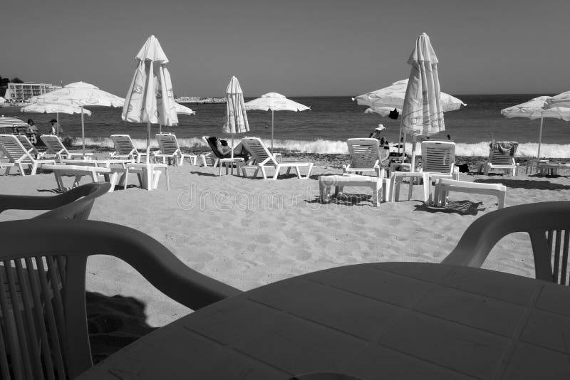View on the Beach from the Bar Table in Black and White Stock Photo ...