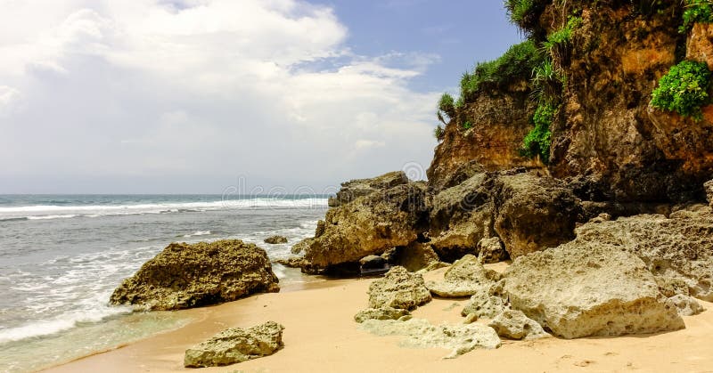 View on the Beach with Rock, Sand, Wave and White Cloud Stock Image ...