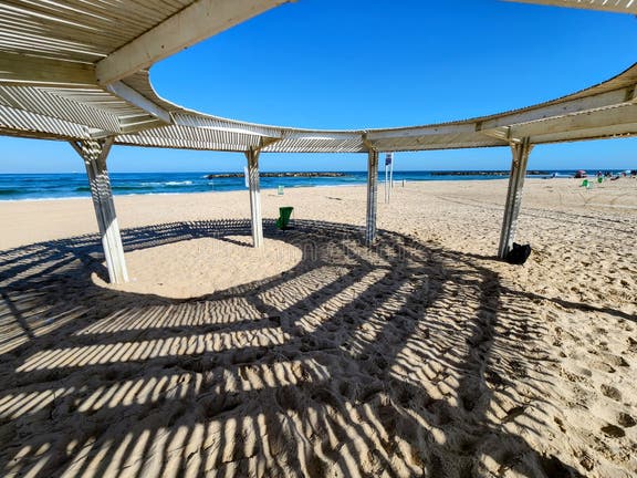 View of Beach with Shade Construction and Sand Dunes Stock Photo ...