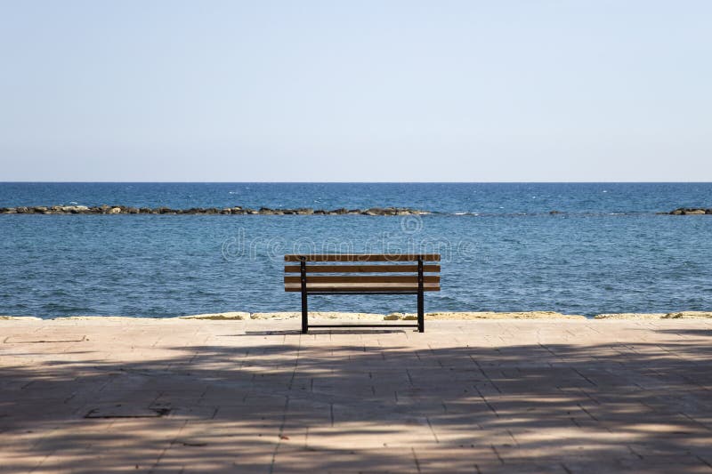 Bench on the beach stock photo. Image of seascape, scenic - 125722276