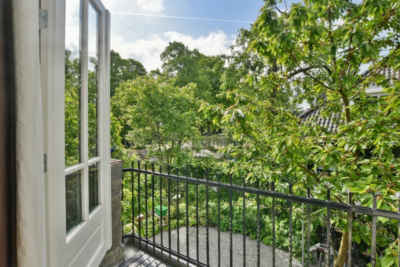 A Balcony with a View of Buildings and a Balcony Stock Image - Image of ...