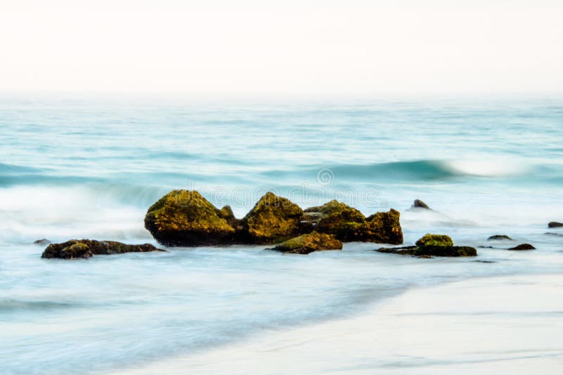 View of a Beautiful Beach and Some Rocks on it Stock Image - Image of ...