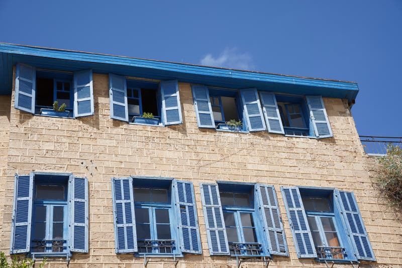 View of Beautiful Building with Blue Shutters in Old Jaffa Stock Image ...