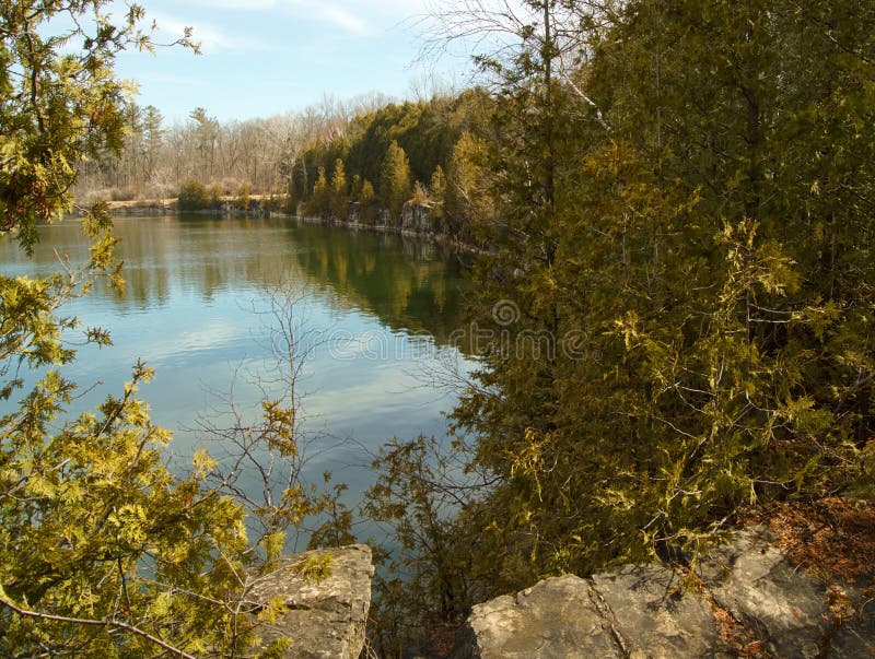 Limestone Quarry Landscape with Reflections in Shiny Water Stock Photo ...
